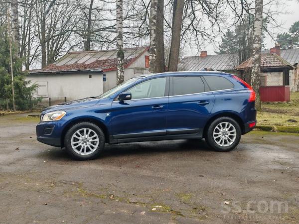 Blue Volvo XC60 2012 in Riga, with an engine capacity of 2.40 L and mileage of 285 thousand km for 10650 €, photo 8 on AUTOMOTO.COM.LV