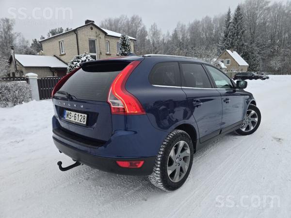 Blue Volvo XC60 2012 in Riga, with an engine capacity of 2.00 L and mileage of 393 thousand km for 6990 €, photo 4 on AUTOMOTO.COM.LV