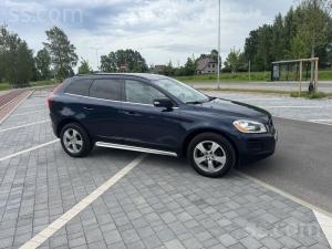 Blue Volvo XC60 2012 in Jelgava, with an engine capacity of 2.40 L and mileage of 0 thousand km for 9990 €, photo 6 on AUTOMOTO.COM.LV