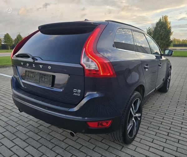 Blue Volvo XC60 2012 in Panevezys, with an engine capacity of 2.40 L and mileage of 342 thousand km for 6999 €, photo 7 on AUTOMOTO.COM.LV