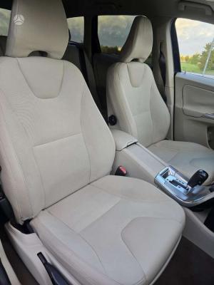 Blue Volvo XC60 2012 in Panevezys, with an engine capacity of 2.40 L and mileage of 342 thousand km for 6999 €, photo 14 on AUTOMOTO.COM.LV