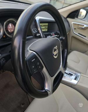 Blue Volvo XC60 2012 in Panevezys, with an engine capacity of 2.40 L and mileage of 342 thousand km for 6999 €, photo 22 on AUTOMOTO.COM.LV