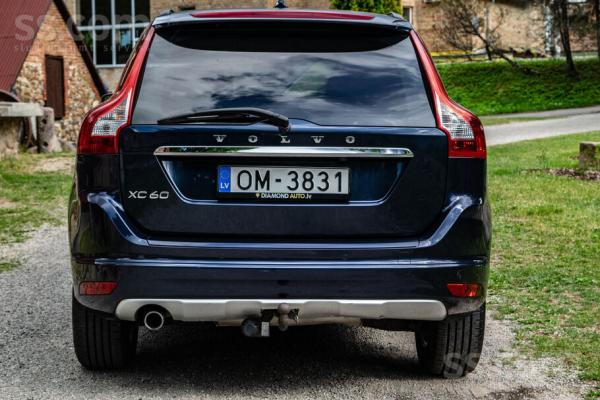 Blue Volvo XC60 2013 in Tukums, with an engine capacity of 2.00 L and mileage of 250 thousand km for 11780 €, photo 5 on AUTOMOTO.COM.LV