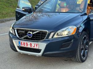 Blue Volvo XC60 2013 in Jonava, with an engine capacity of 2.40 L and mileage of 290 thousand km for 10899 €, photo 5 on AUTOMOTO.COM.LV