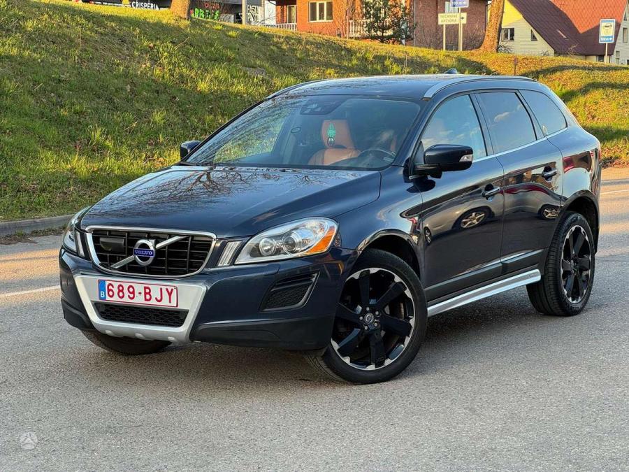 Blue Volvo XC60 2013 in Jonava, with an engine capacity of 2.40 L and mileage of 290 thousand km for 10899 €, photo 6 on AUTOMOTO.COM.LV