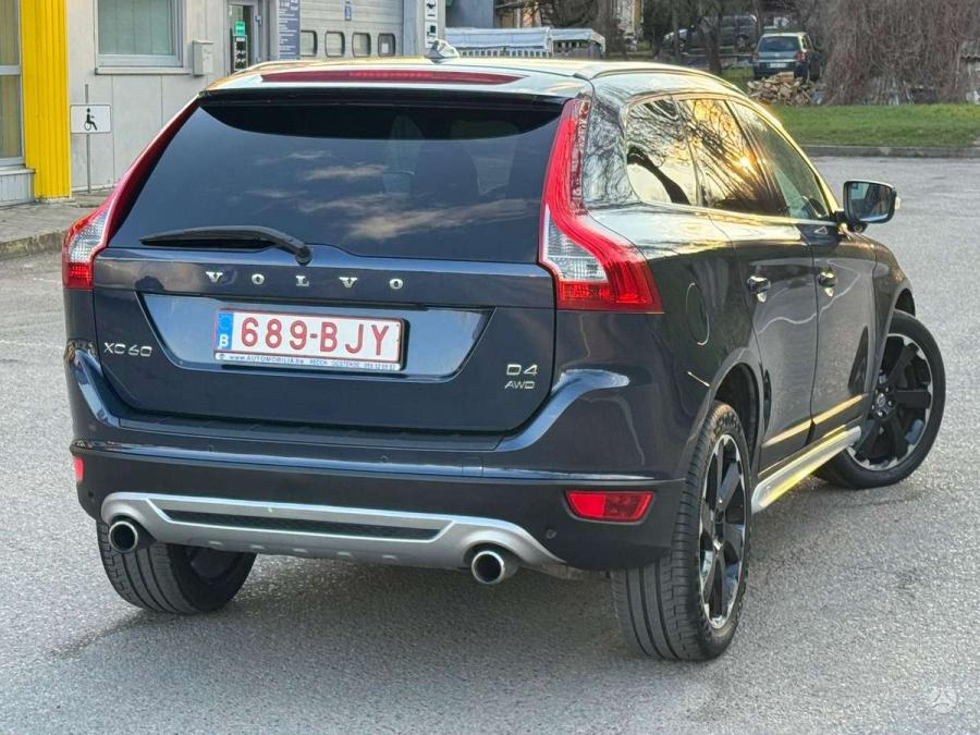 Blue Volvo XC60 2013 in Jonava, with an engine capacity of 2.40 L and mileage of 290 thousand km for 10899 €, photo 8 on AUTOMOTO.COM.LV