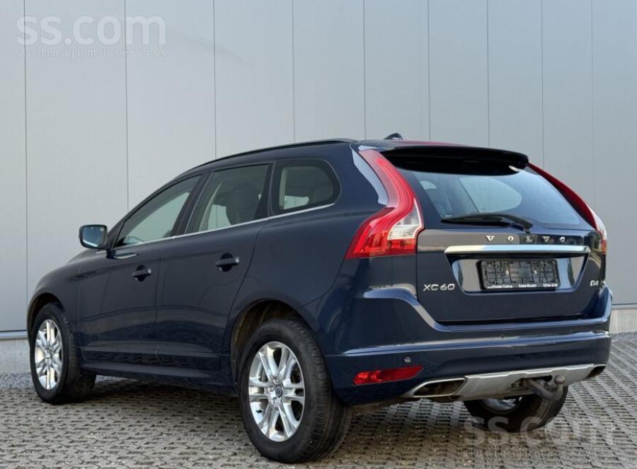 Blue Volvo XC60 2014 in Valmiera, with an engine capacity of 2.00 L and mileage of 213 thousand km for 14900 €, photo 3 on AUTOMOTO.COM.LV