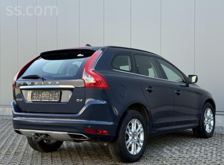 Blue Volvo XC60 2014 in Valmiera, with an engine capacity of 2.00 L and mileage of 213 thousand km for 14900 €, photo 4 on AUTOMOTO.COM.LV