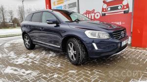 Blue Volvo XC60 2014 in Jelgava, with an engine capacity of 2.00 L and mileage of 210 thousand km for 10990 €, photo 5 on AUTOMOTO.COM.LV