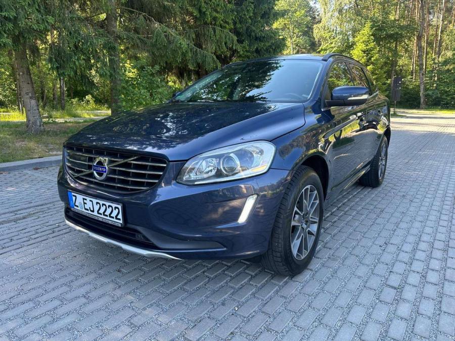 Blue Volvo XC60 2014 in Vilnius, with an engine capacity of 2.40 L and mileage of 276 thousand km for 12900 €, photo 4 on AUTOMOTO.COM.LV