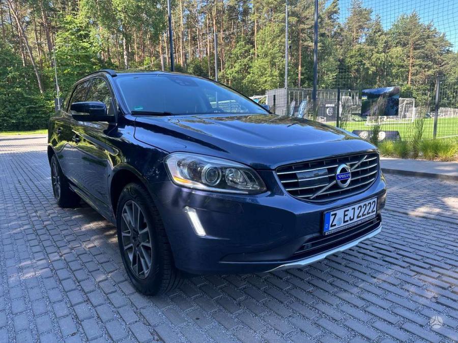 Blue Volvo XC60 2014 in Vilnius, with an engine capacity of 2.40 L and mileage of 276 thousand km for 12900 €, photo 12 on AUTOMOTO.COM.LV