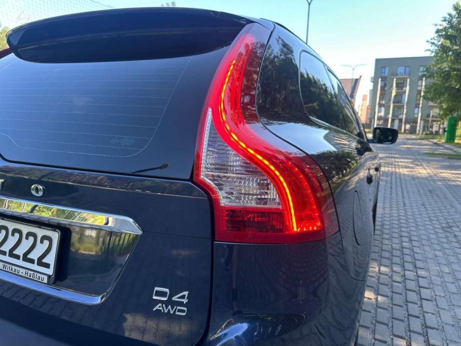 Blue Volvo XC60 2014 in Vilnius, with an engine capacity of 2.40 L and mileage of 276 thousand km for 12900 €, photo 16 on AUTOMOTO.COM.LV