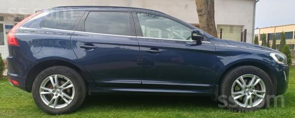 Blue Volvo XC60 2014 in Tukums, with an engine capacity of 2.00 L and mileage of 246 thousand km for 11995 €, photo 4 on AUTOMOTO.COM.LV