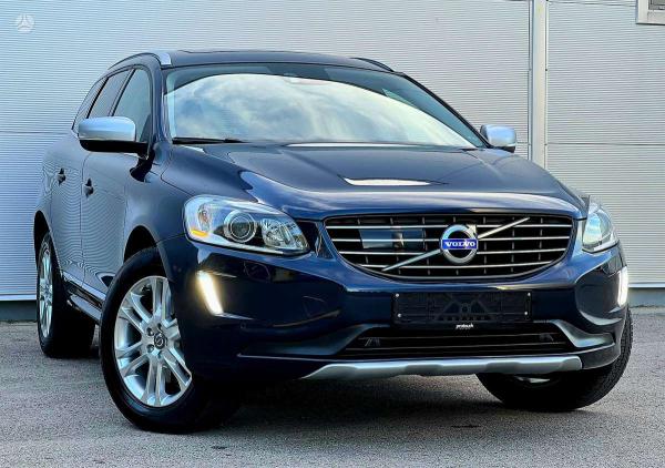 Blue Volvo XC60 2014 in Utena, with an engine capacity of 2.40 L and mileage of 326 thousand km for 13999 €, photo 4 on AUTOMOTO.COM.LV