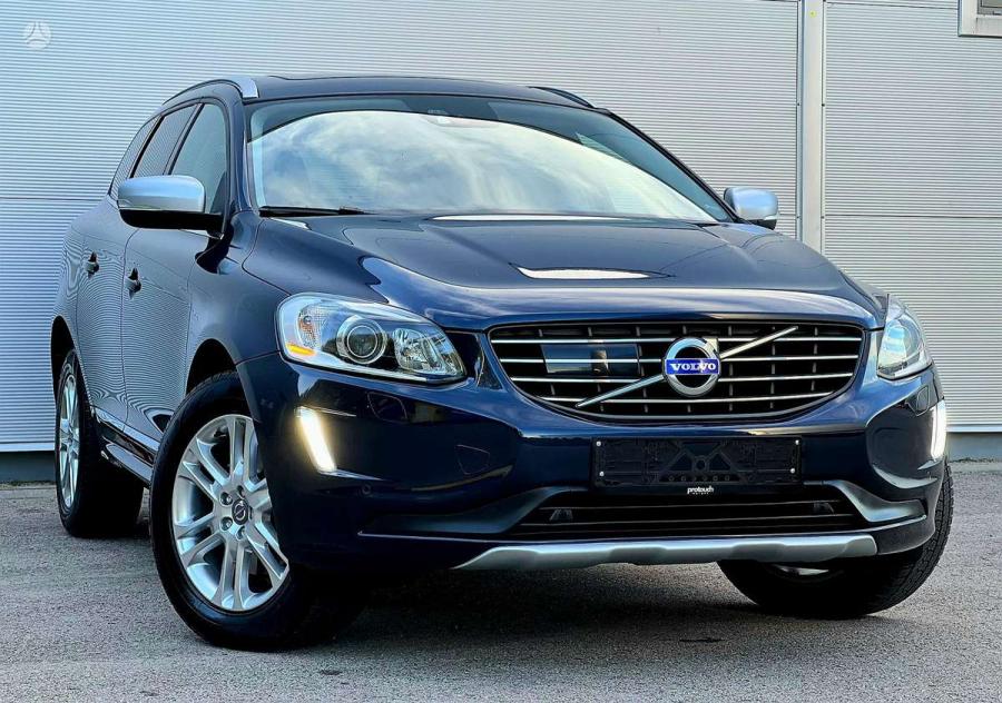 Blue Volvo XC60 2014 in Utena, with an engine capacity of 2.40 L and mileage of 326 thousand km for 13999 €, photo 4 on AUTOMOTO.COM.LV
