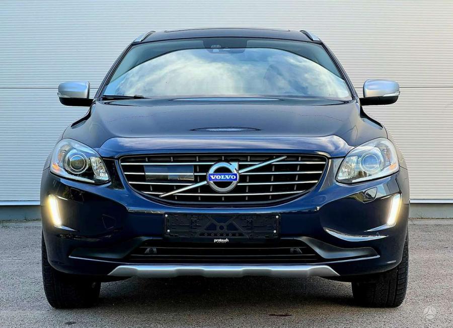 Blue Volvo XC60 2014 in Utena, with an engine capacity of 2.40 L and mileage of 326 thousand km for 13999 €, photo 11 on AUTOMOTO.COM.LV