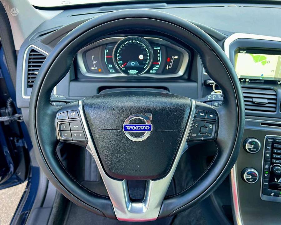 Blue Volvo XC60 2014 in Utena, with an engine capacity of 2.40 L and mileage of 326 thousand km for 13999 €, photo 16 on AUTOMOTO.COM.LV