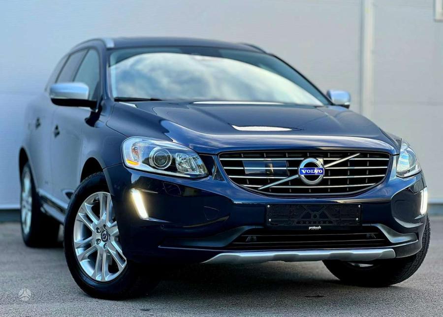 Blue Volvo XC60 2014 in Utena, with an engine capacity of 2.40 L and mileage of 326 thousand km for 13999 €, photo 55 on AUTOMOTO.COM.LV