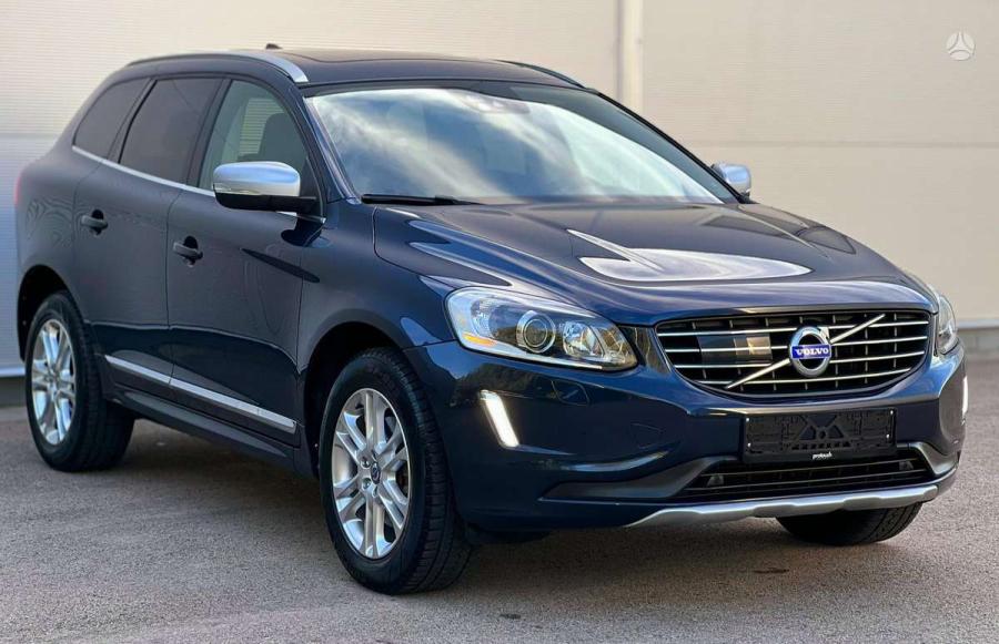 Blue Volvo XC60 2014 in Utena, with an engine capacity of 2.40 L and mileage of 326 thousand km for 13999 €, photo 58 on AUTOMOTO.COM.LV