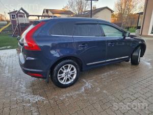 Blue Volvo XC60 2015 in Tukums, with an engine capacity of 2.40 L and mileage of 186 thousand km for 15200 €, photo 4 on AUTOMOTO.COM.LV