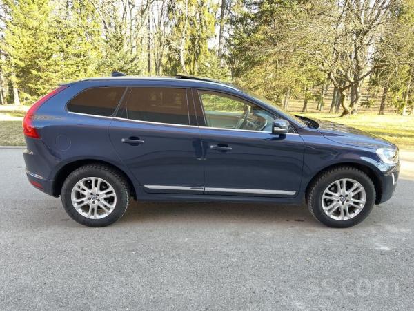 Blue Volvo XC60 2015 in Valmiera, with an engine capacity of 2.50 L and mileage of 172 thousand km for 13100 €, photo 6 on AUTOMOTO.COM.LV