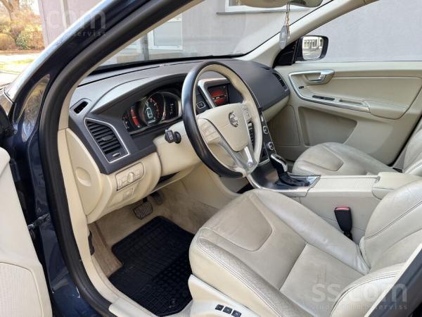 Blue Volvo XC60 2015 in Valmiera, with an engine capacity of 2.50 L and mileage of 172 thousand km for 13100 €, photo 10 on AUTOMOTO.COM.LV
