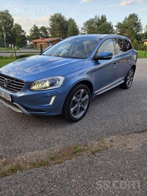 Blue Volvo XC60 2015 in Riga, with an engine capacity of 2.00 L and mileage of 354 thousand km for 12899 €, photo 4 on AUTOMOTO.COM.LV