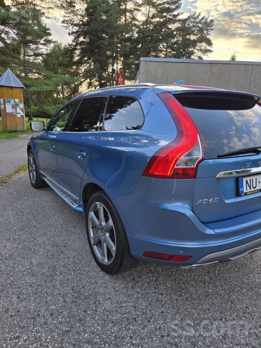 Blue Volvo XC60 2015 in Riga, with an engine capacity of 2.00 L and mileage of 354 thousand km for 12899 €, photo 8 on AUTOMOTO.COM.LV