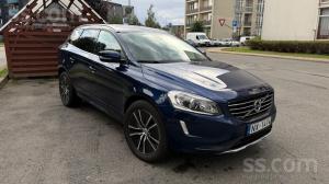 Blue Volvo XC60 2015 in Riga, with an engine capacity of 2.40 L and mileage of 293 thousand km for 13500 €, photo 3 on AUTOMOTO.COM.LV