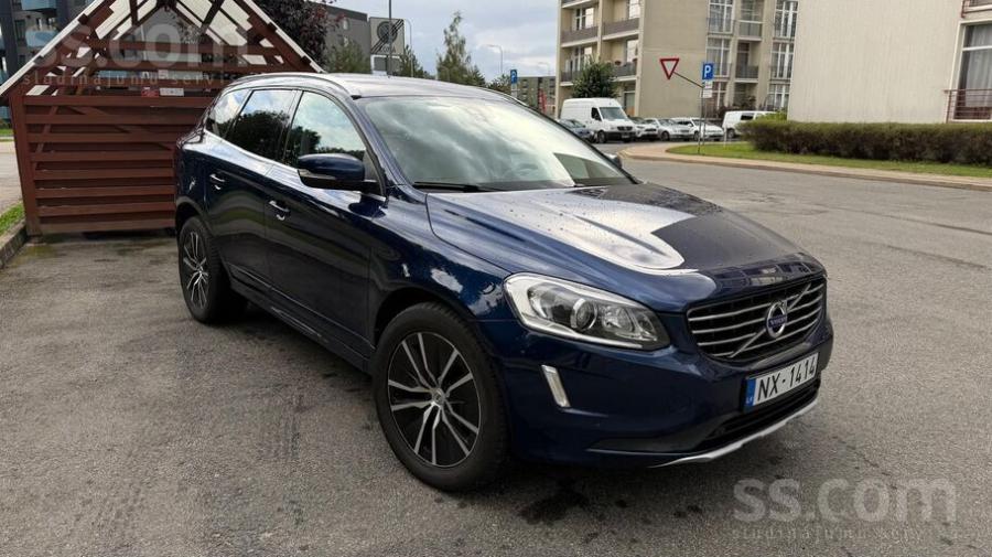 Blue Volvo XC60 2015 in Riga, with an engine capacity of 2.40 L and mileage of 293 thousand km for 13500 €, photo 3 on AUTOMOTO.COM.LV