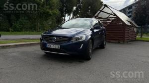 Blue Volvo XC60 2015 in Riga, with an engine capacity of 2.40 L and mileage of 293 thousand km for 13500 €, photo 8 on AUTOMOTO.COM.LV