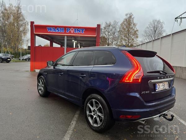 Blue Volvo XC60 2016 in Riga, with an engine capacity of 2.00 L and mileage of 230 thousand km for 13400 €, photo 3 on AUTOMOTO.COM.LV