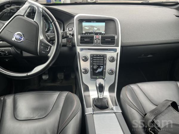 Blue Volvo XC60 2016 in Riga, with an engine capacity of 2.00 L and mileage of 230 thousand km for 13400 €, photo 7 on AUTOMOTO.COM.LV