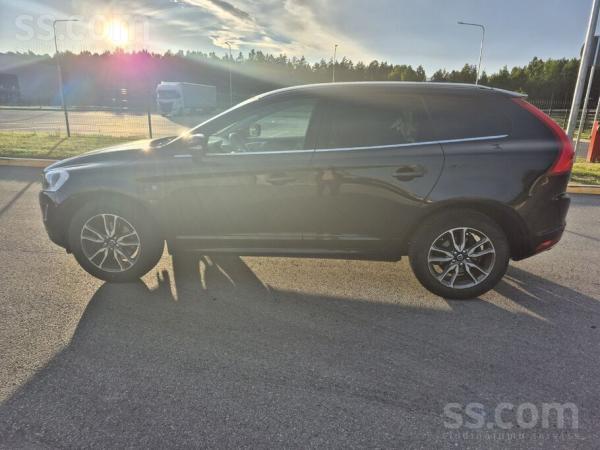 Blue Volvo XC60 2016 in Riga, with an engine capacity of 2.00 L and mileage of 180 thousand km for 13700 €, photo 2 on AUTOMOTO.COM.LV