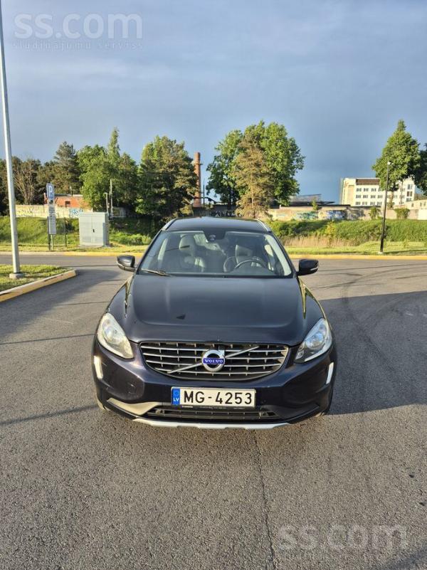 Blue Volvo XC60 2016 in Riga, with an engine capacity of 2.00 L and mileage of 180 thousand km for 13700 €, photo 4 on AUTOMOTO.COM.LV
