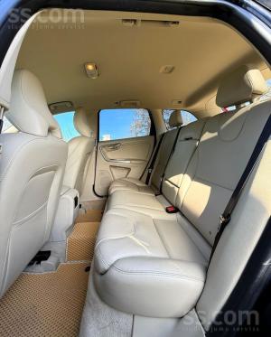 Blue Volvo XC60 2016 in Riga, with an engine capacity of 2.40 L and mileage of 222 thousand km for 19000 €, photo 7 on AUTOMOTO.COM.LV