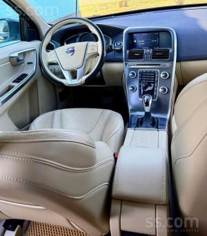 Blue Volvo XC60 2016 in Riga, with an engine capacity of 2.40 L and mileage of 222 thousand km for 19000 €, photo 9 on AUTOMOTO.COM.LV