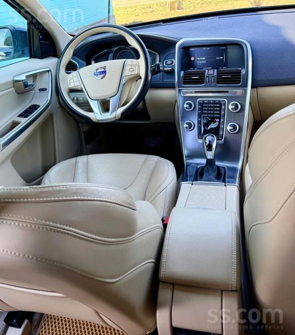 Blue Volvo XC60 2016 in Riga, with an engine capacity of 2.40 L and mileage of 222 thousand km for 18700 €, photo 8 on AUTOMOTO.COM.LV