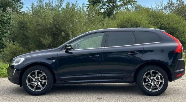 Blue Volvo XC60 2016 in Utena, with an engine capacity of 2.40 L and mileage of 219 thousand km for 13800 €, photo 7 on AUTOMOTO.COM.LV