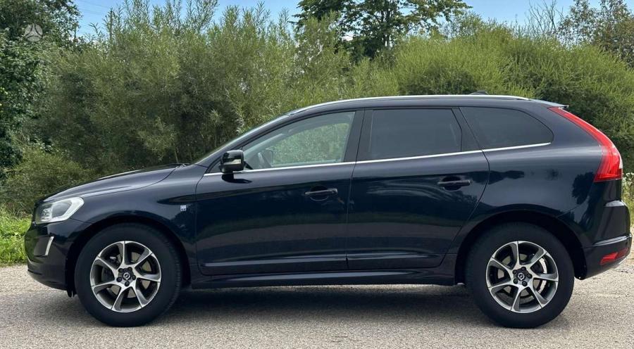 Blue Volvo XC60 2016 in Utena, with an engine capacity of 2.40 L and mileage of 219 thousand km for 13800 €, photo 8 on AUTOMOTO.COM.LV