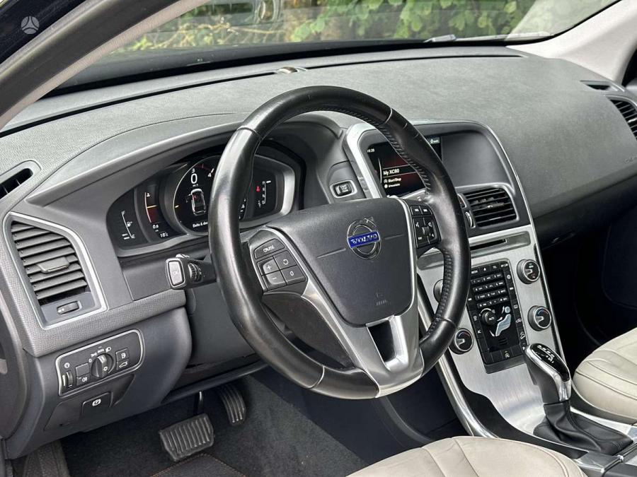 Blue Volvo XC60 2016 in Utena, with an engine capacity of 2.40 L and mileage of 219 thousand km for 13800 €, photo 16 on AUTOMOTO.COM.LV