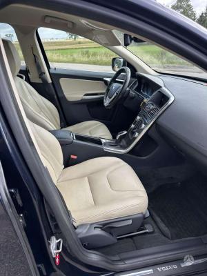 Blue Volvo XC60 2016 in Marijampole, with an engine capacity of 2.00 L and mileage of 311 thousand km for 9200 €, photo 13 on AUTOMOTO.COM.LV