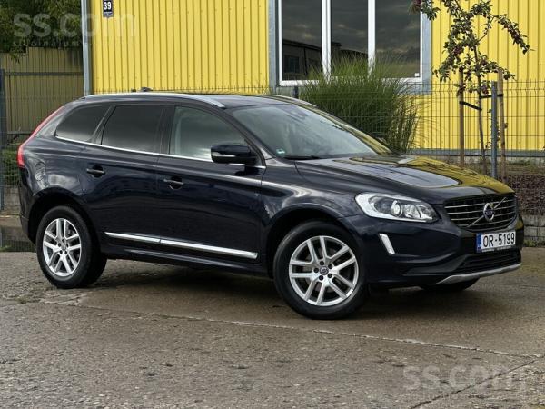 Blue Volvo XC60 2016 in Riga, with an engine capacity of 2.40 L and mileage of 222 thousand km for 15500 €, photo 5 on AUTOMOTO.COM.LV