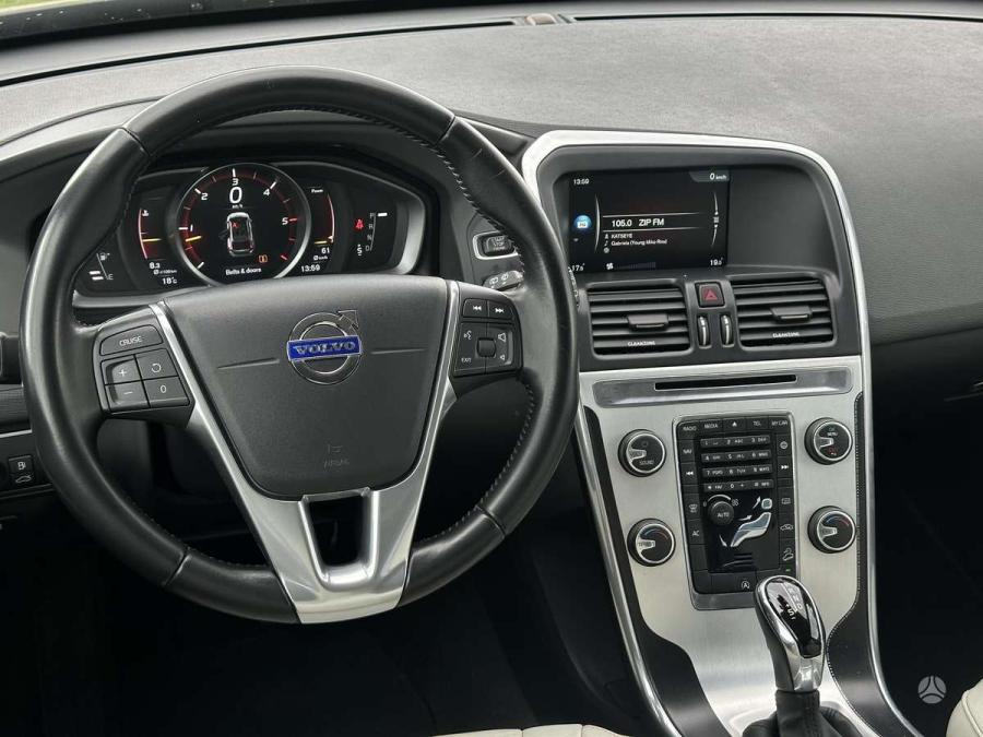 Blue Volvo XC60 2016 in Utena, with an engine capacity of 2.40 L and mileage of 219 thousand km for 13600 €, photo 15 on AUTOMOTO.COM.LV