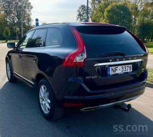 Blue Volvo XC60 2016 in Riga, with an engine capacity of 2.40 L and mileage of 227 thousand km for 16988 €, photo 4 on AUTOMOTO.COM.LV