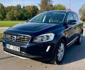 Blue Volvo XC60 2016 in Riga, with an engine capacity of 2.40 L and mileage of 227 thousand km for 16988 €, photo 5 on AUTOMOTO.COM.LV