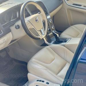 Blue Volvo XC60 2016 in Riga, with an engine capacity of 2.40 L and mileage of 227 thousand km for 16988 €, photo 8 on AUTOMOTO.COM.LV