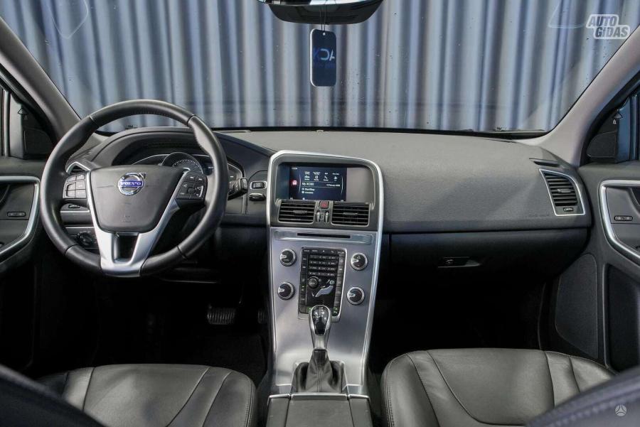 Blue Volvo XC60 2017 in Marijampole, with an engine capacity of 2.00 L and mileage of 303 thousand km for 10950 €, photo 16 on AUTOMOTO.COM.LV