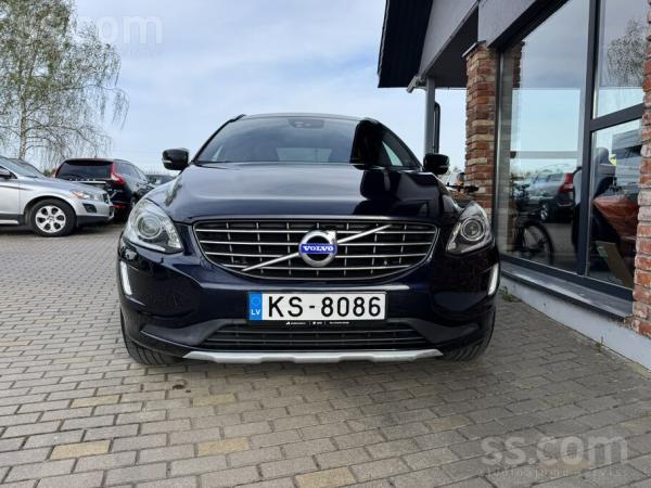 Blue Volvo XC60 2017 in Talsi, with an engine capacity of 2.40 L and mileage of 229 thousand km for 15500 €, photo 6 on AUTOMOTO.COM.LV