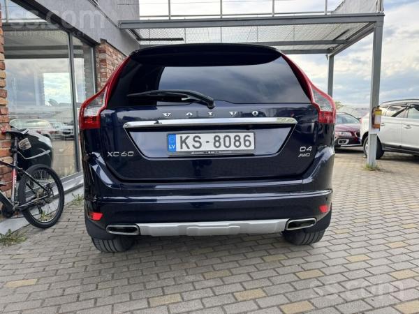 Blue Volvo XC60 2017 in Talsi, with an engine capacity of 2.40 L and mileage of 229 thousand km for 15500 €, photo 10 on AUTOMOTO.COM.LV